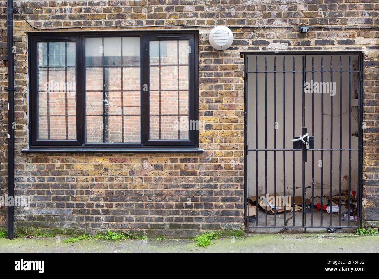 Brick wall with window reflection Stock Photo - Alamy