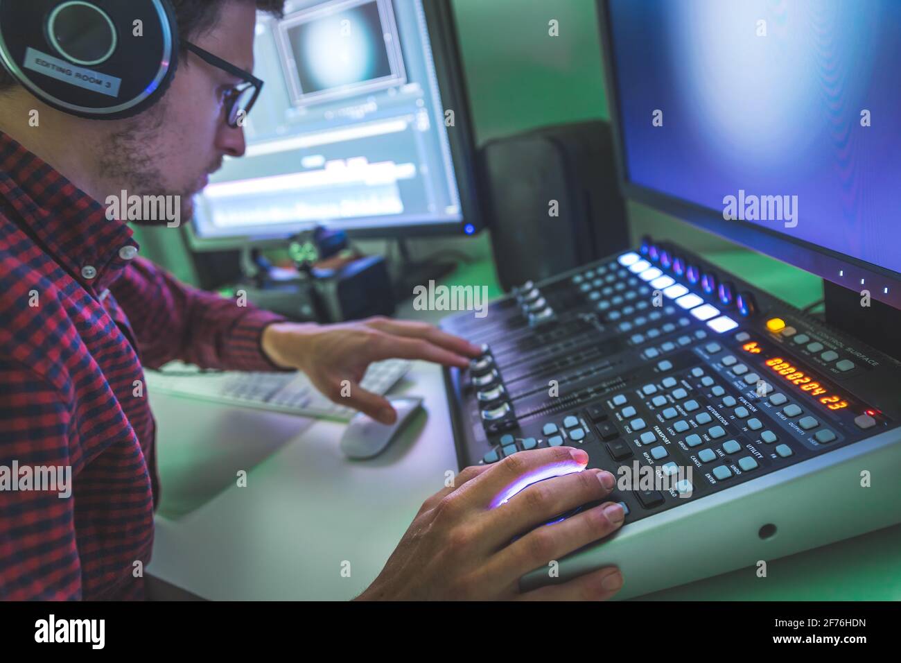 Video editing, recording and cutting room with monitors and sound ...