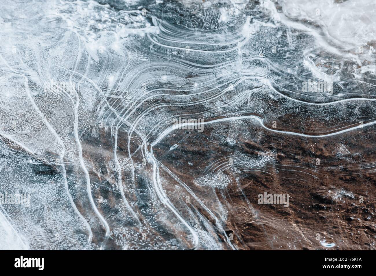 The texture of the thin ice on the water surface Stock Photo - Alamy