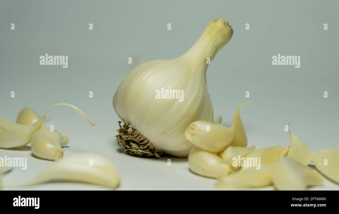 Healthy garlic on a white background. Garlic spice on white Stock Photo ...