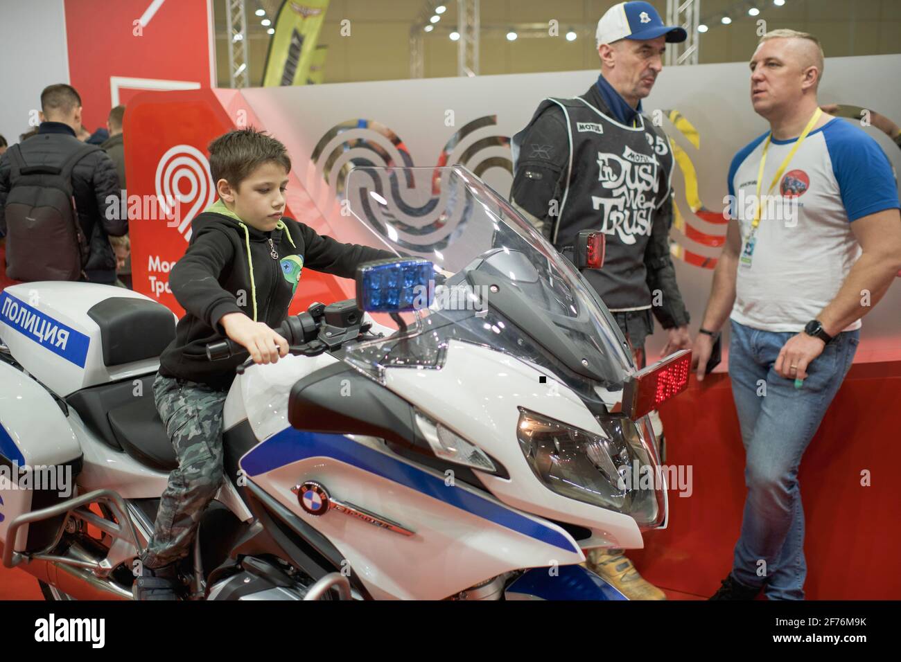 Moscow, Russia. 04th Apr, 2021. A child admiring a police motorcycle ...