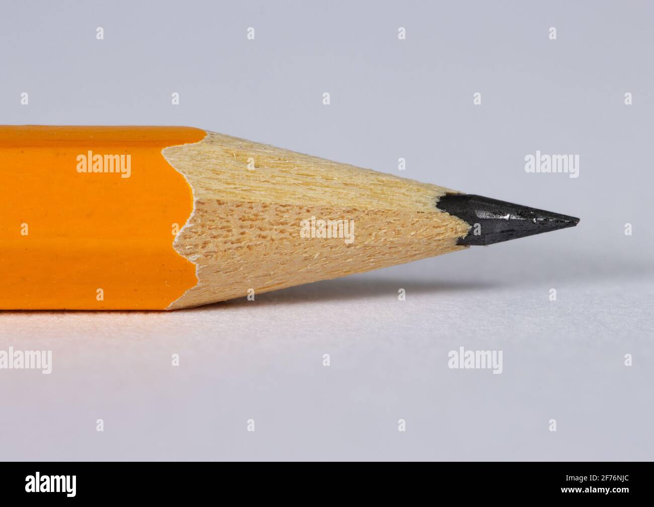 Grey Gray sharpened pencil point to the left on a white background ...