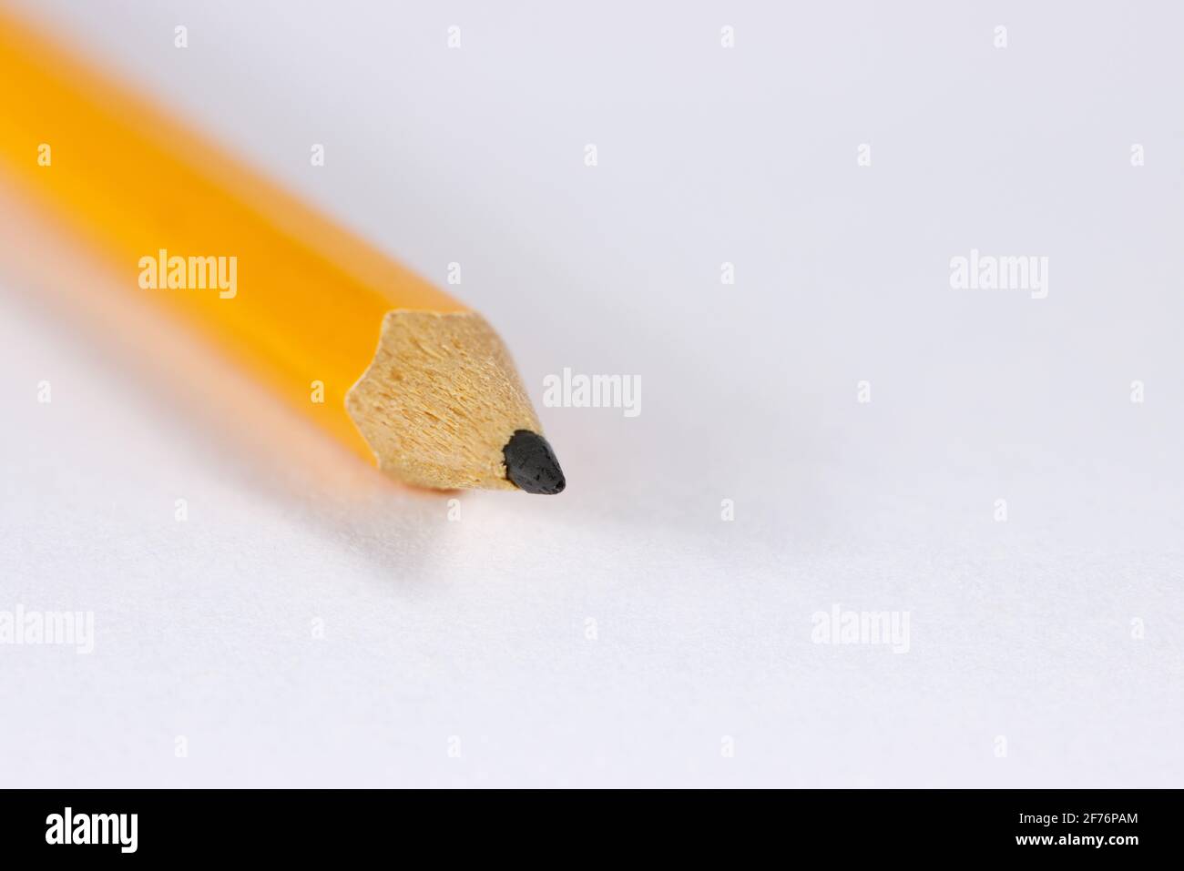 Grey Gray sharpened pencil point to the left on a white background ...
