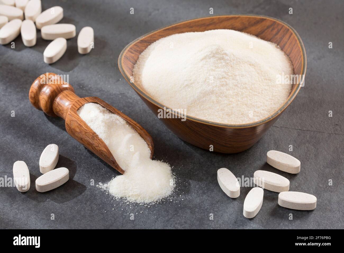Pills and collagen protein powder - Hydrolyzed Stock Photo - Alamy