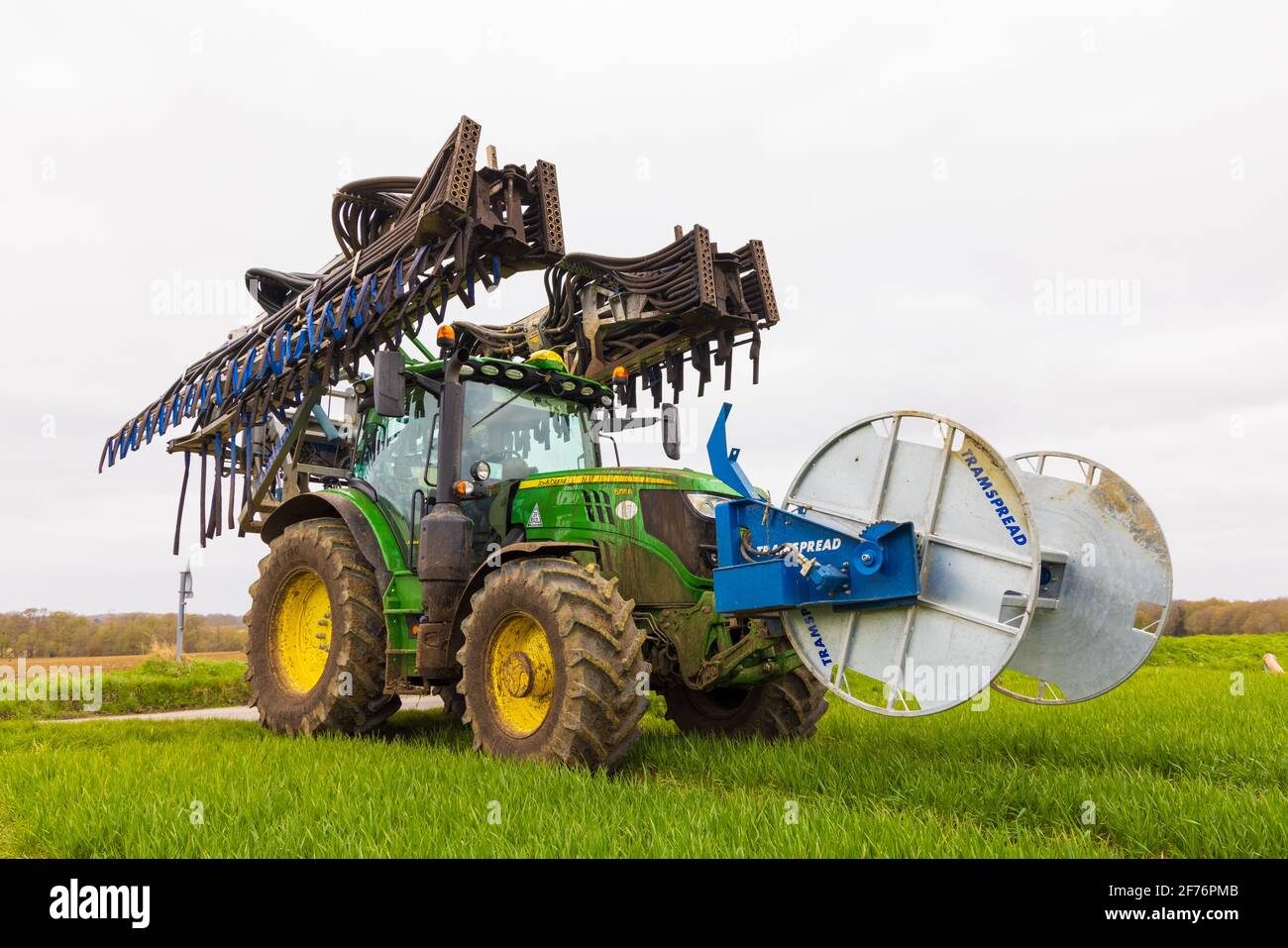 Tractor with a folded Tramspread slurry spreader Dribble Bar and ...