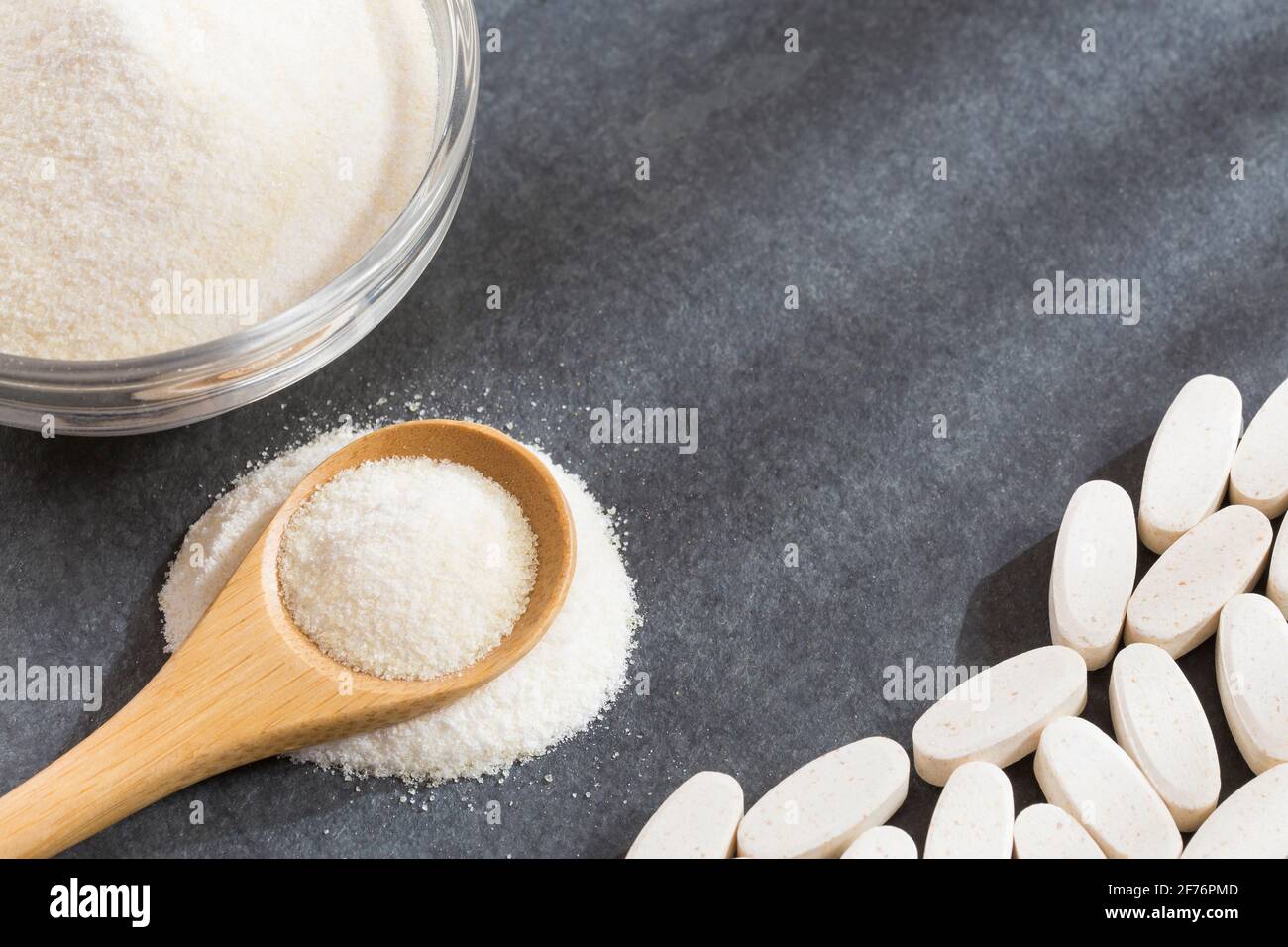Pills and collagen protein powder - Hydrolyzed Stock Photo - Alamy