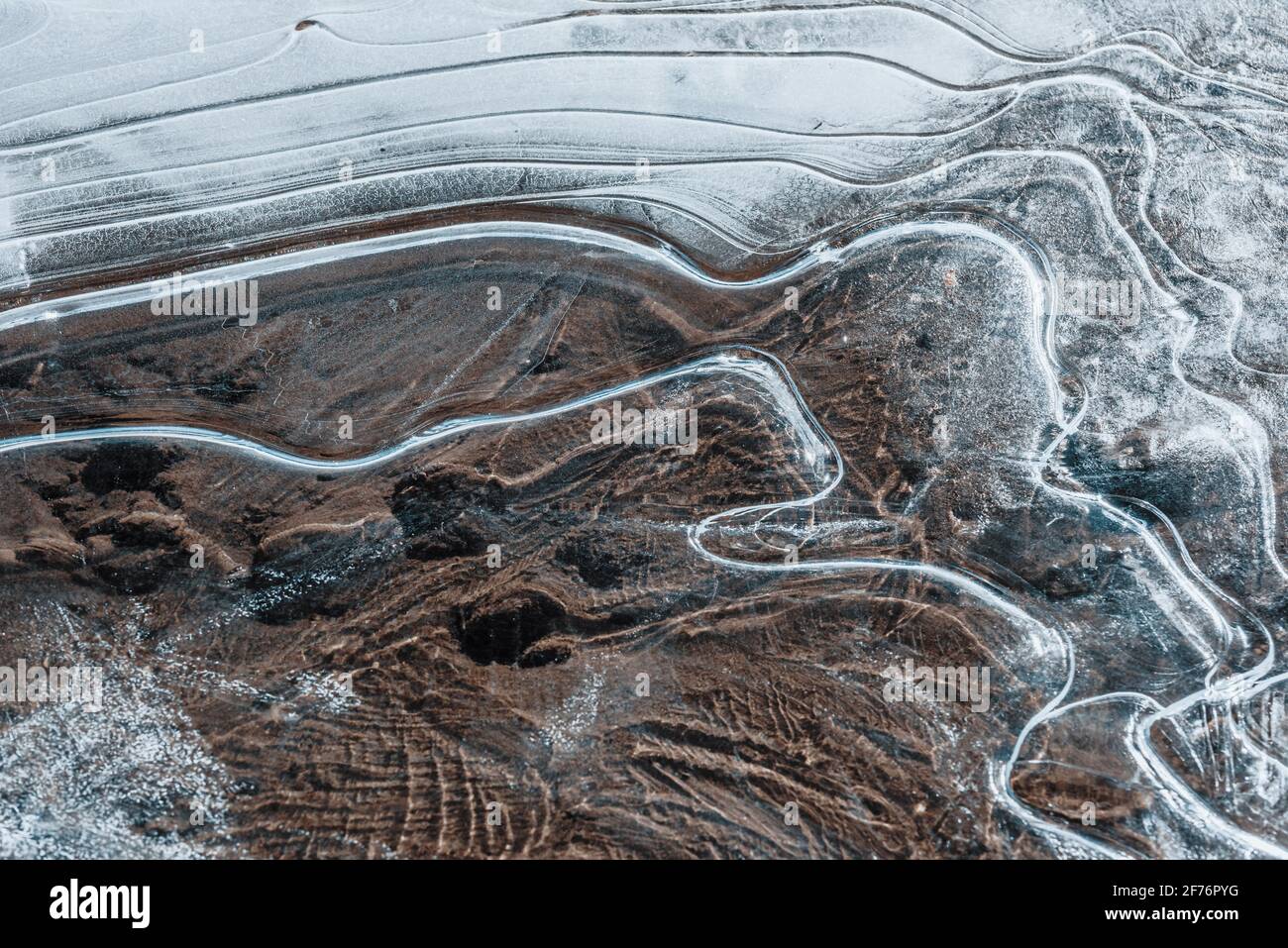 The texture of the thin ice on the water surface Stock Photo - Alamy