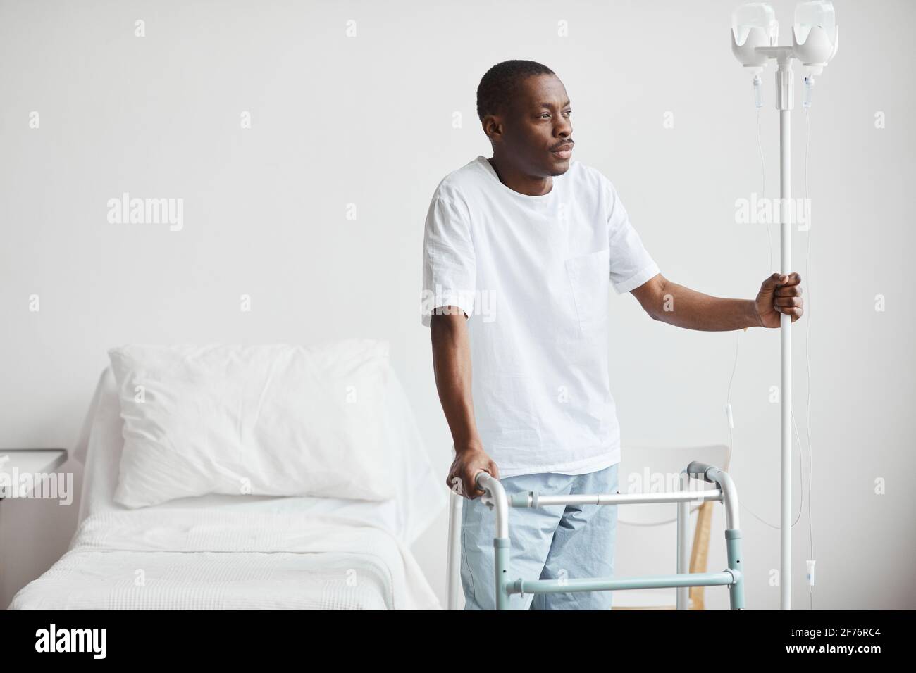 Man hospital bed drip hi-res stock photography and images - Alamy