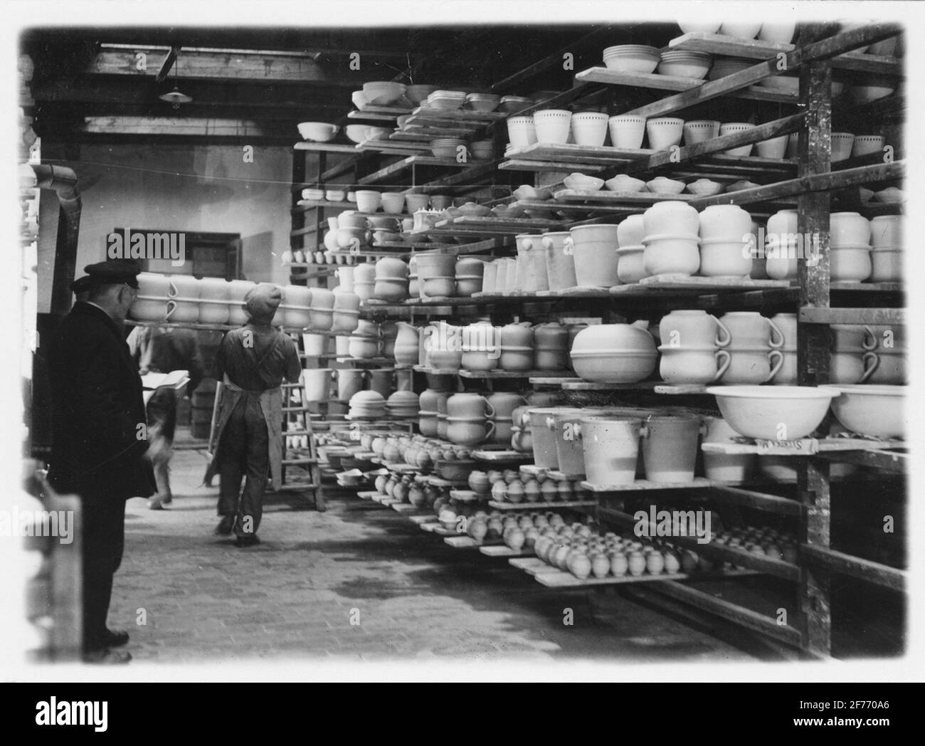 Rörstrand's porcelain factories. The freight room for uncleaned goods ...