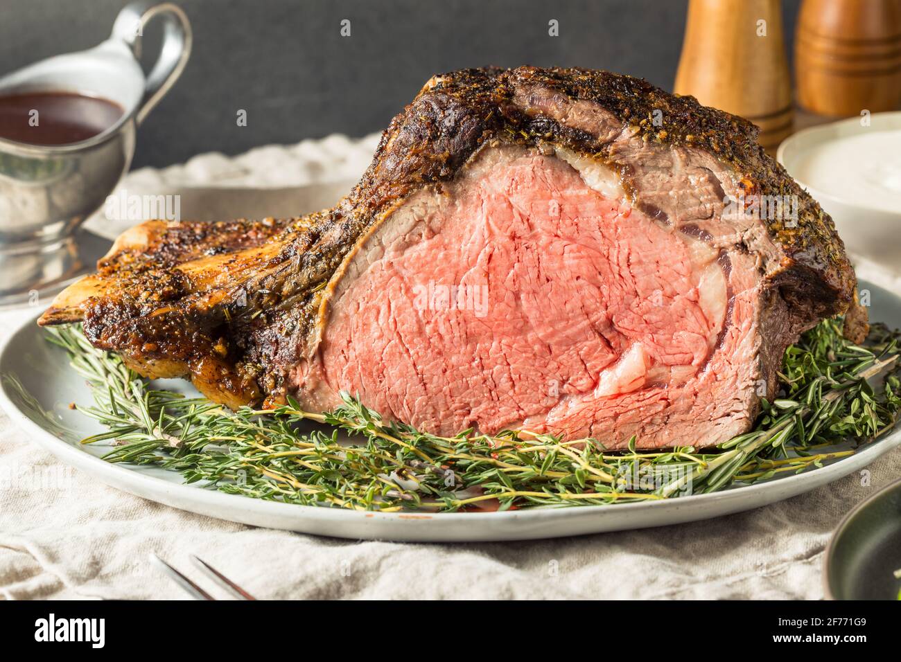 Homemade Prime Rib Beef Roast with Gravy and Herbs Stock Photo - Alamy