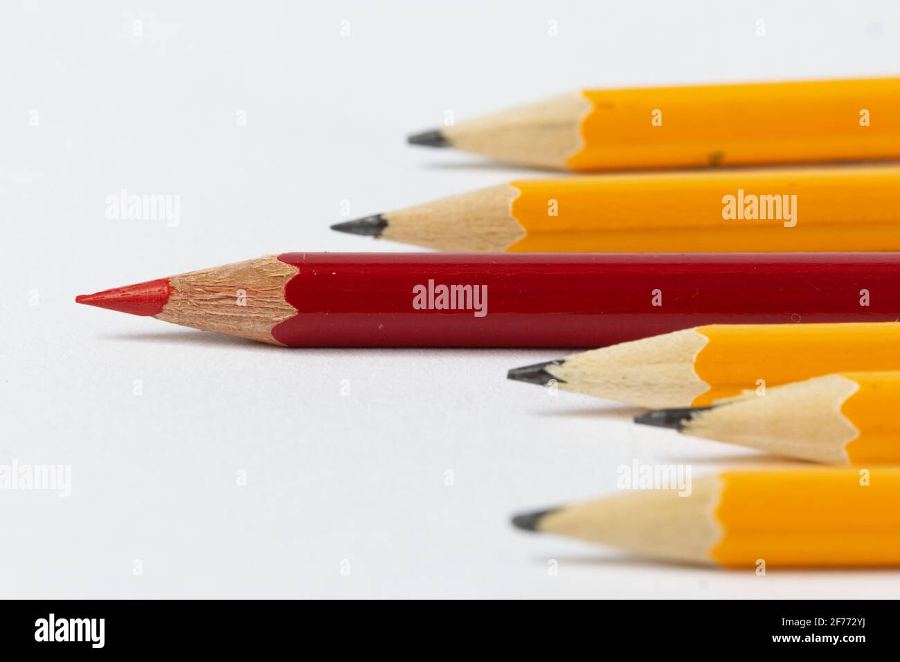 Grey sharp pencil points with one red pencil with copy space Stock ...