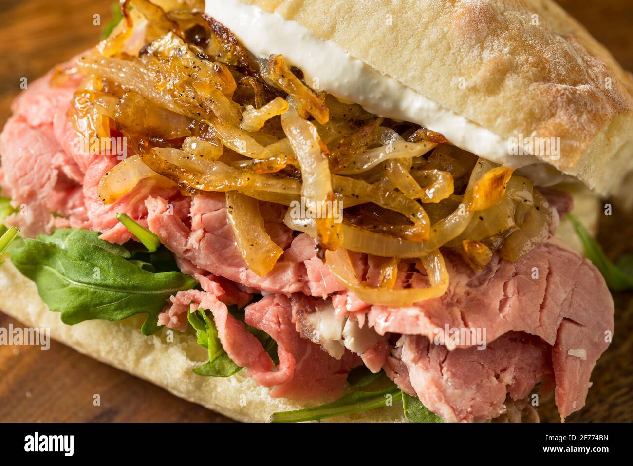 Homemade Prime Rib Sandwich Au Jus with Onions Stock Photo - Alamy