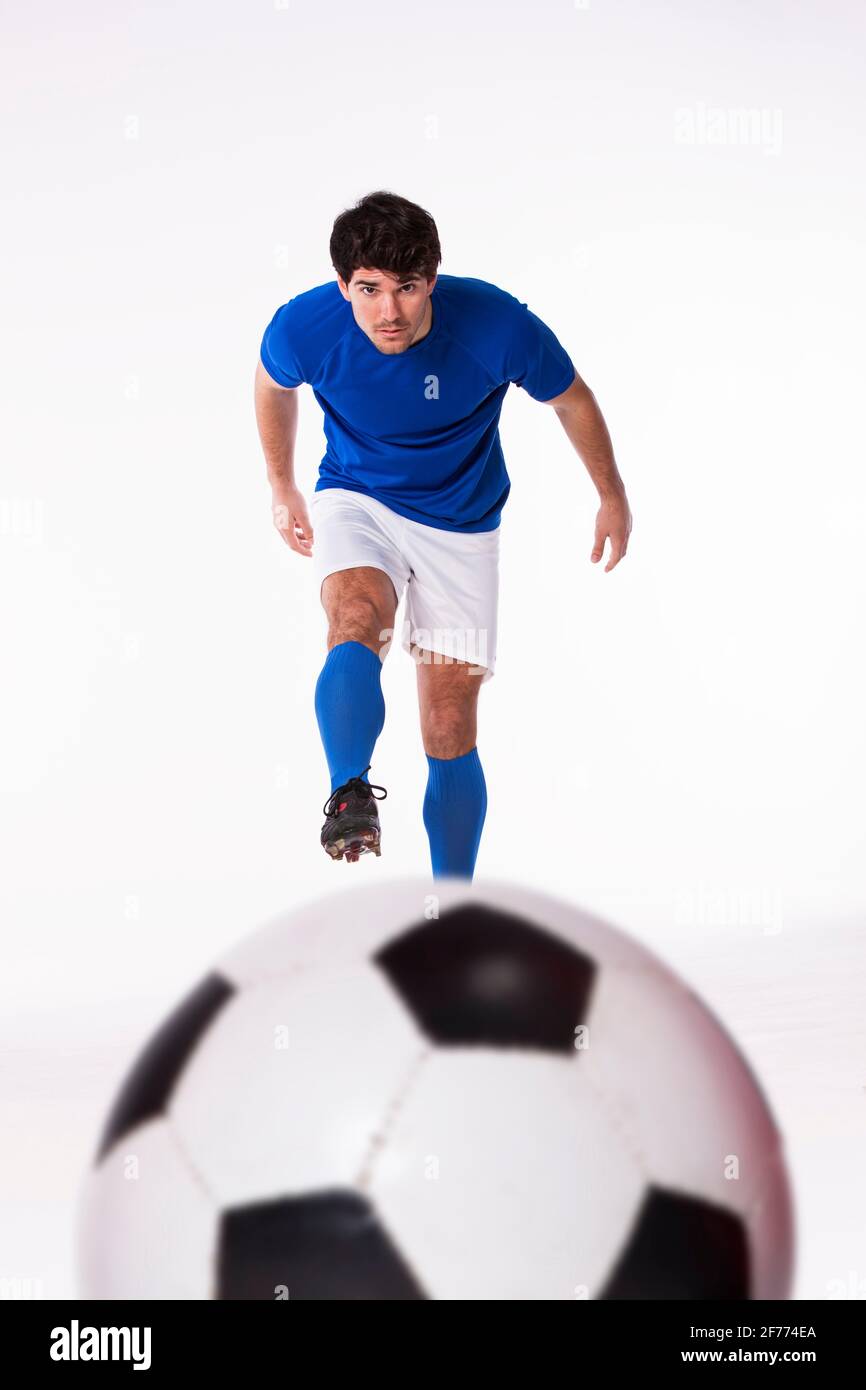 Soccer player with a soccer ball Stock Photo - Alamy