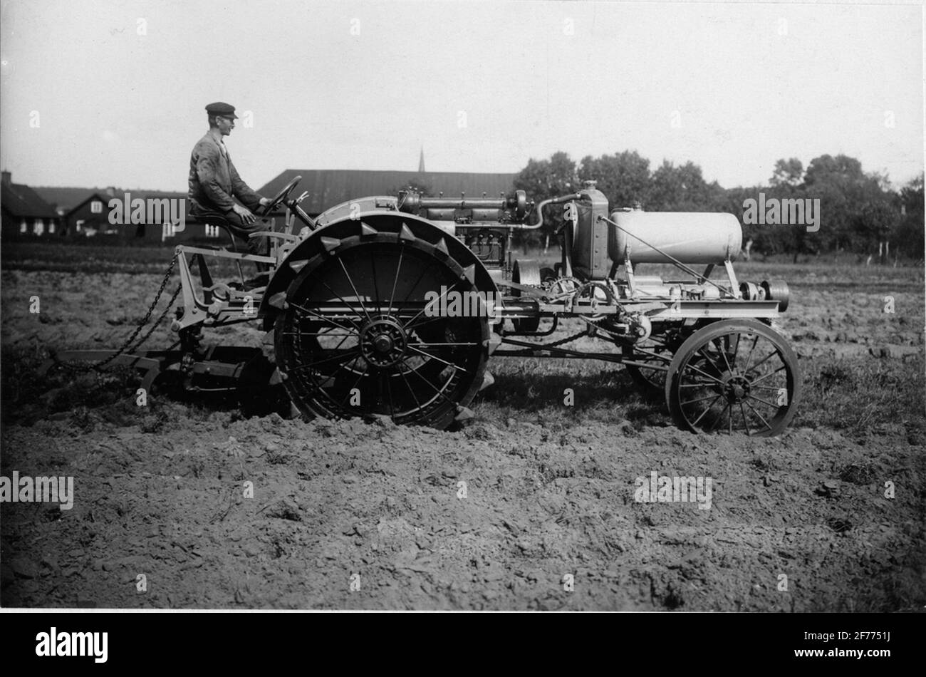 Vehicle tractor with plow Stock Photo - Alamy