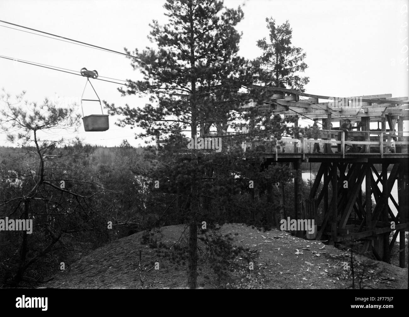 The mine of the intrusion in the valleys. The cable car viewed from the ...