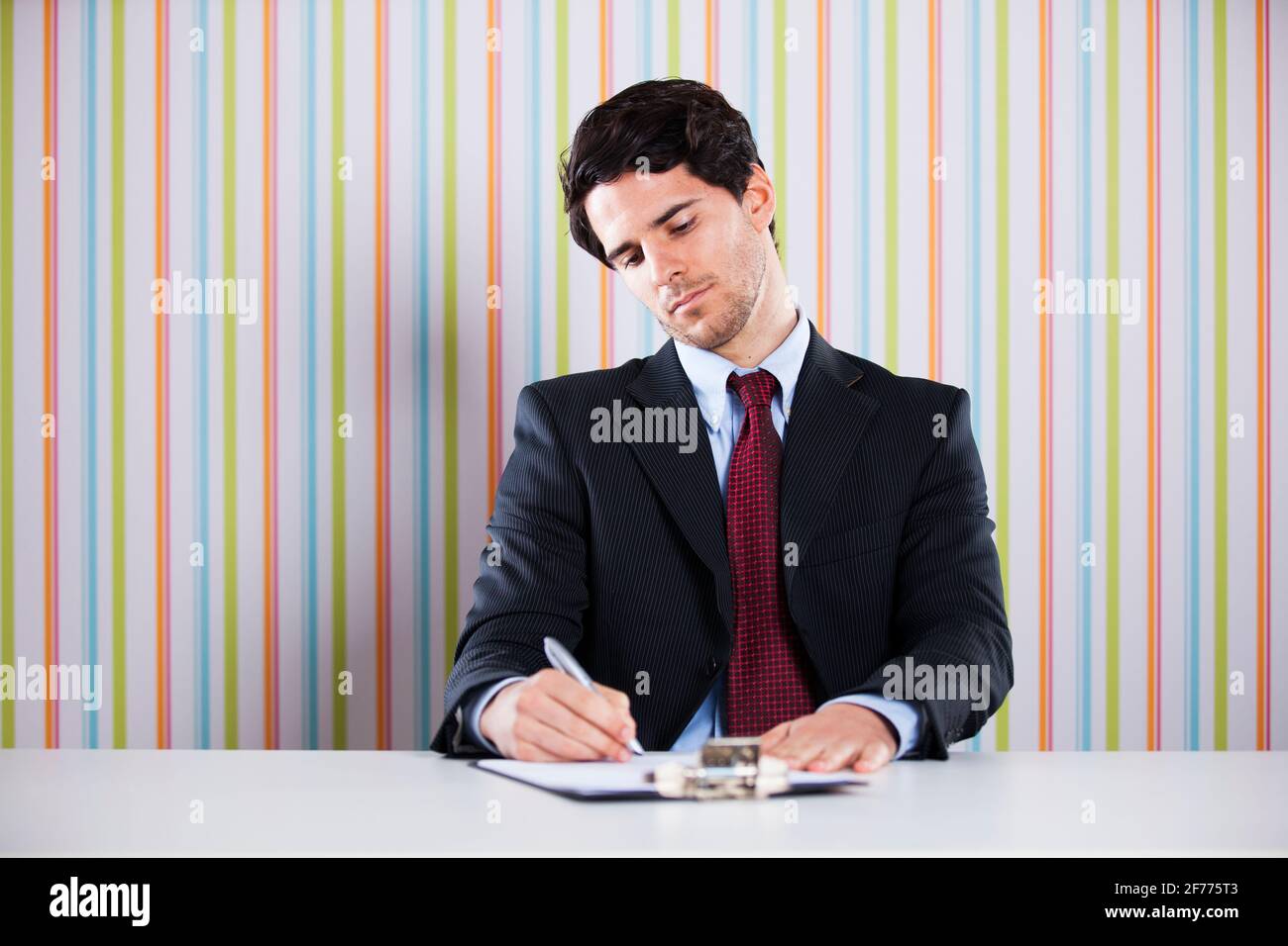 Businessman pen notepad hi-res stock photography and images - Alamy