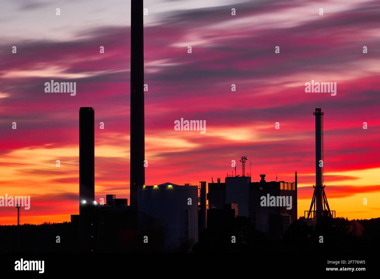 Combined heat and power plant on the amazing sunset background Stock ...