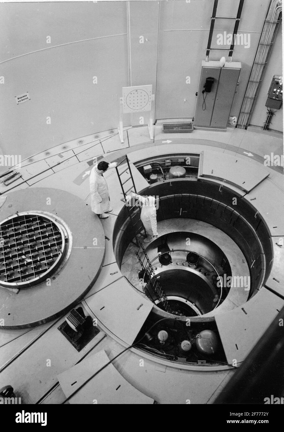 Last stage of assembly work inside reactor casing Stock Photo - Alamy