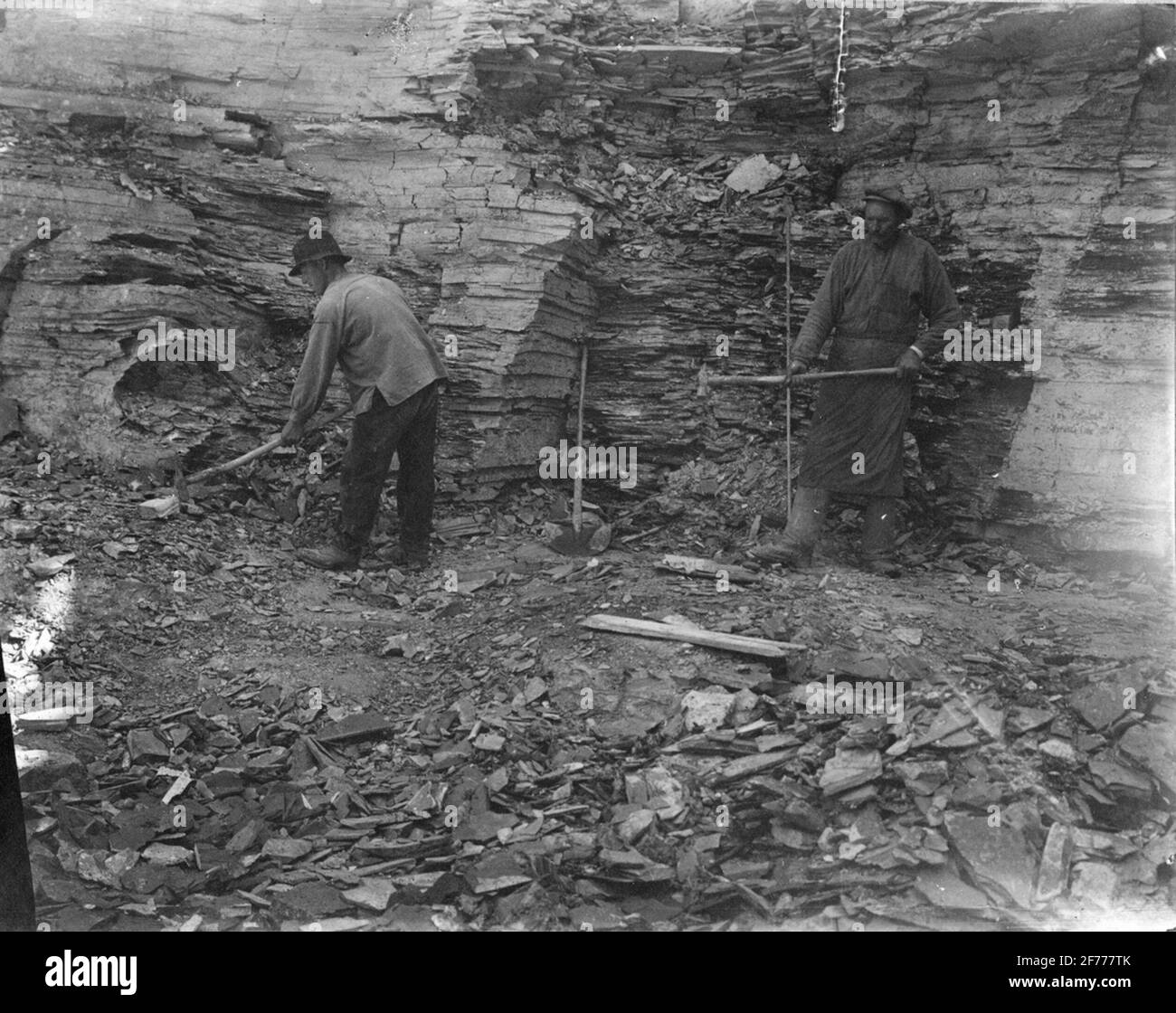 The breaking of slate to limestone burning. Latorps use Stock Photo - Alamy