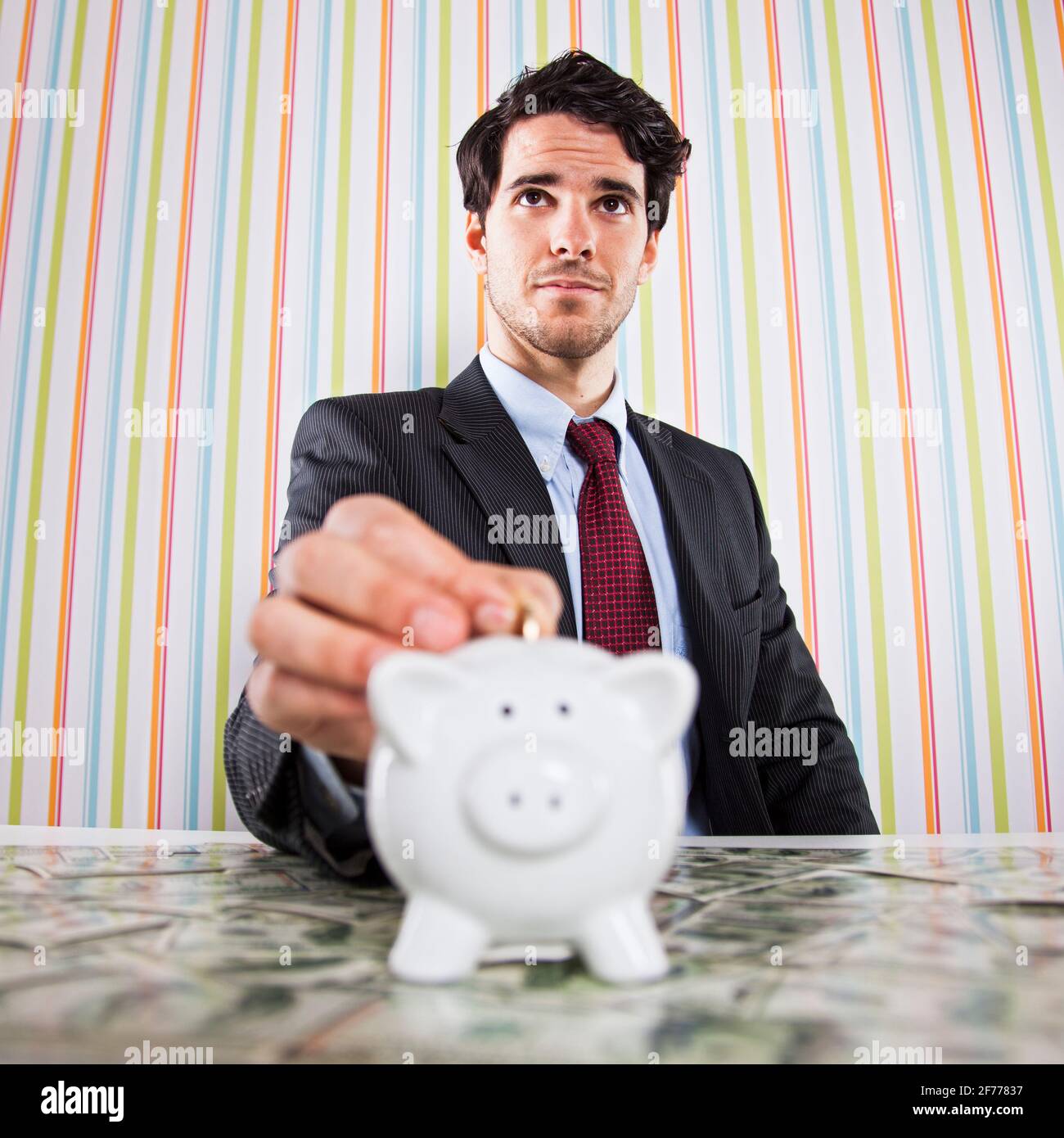 Savings businessman hi-res stock photography and images - Alamy