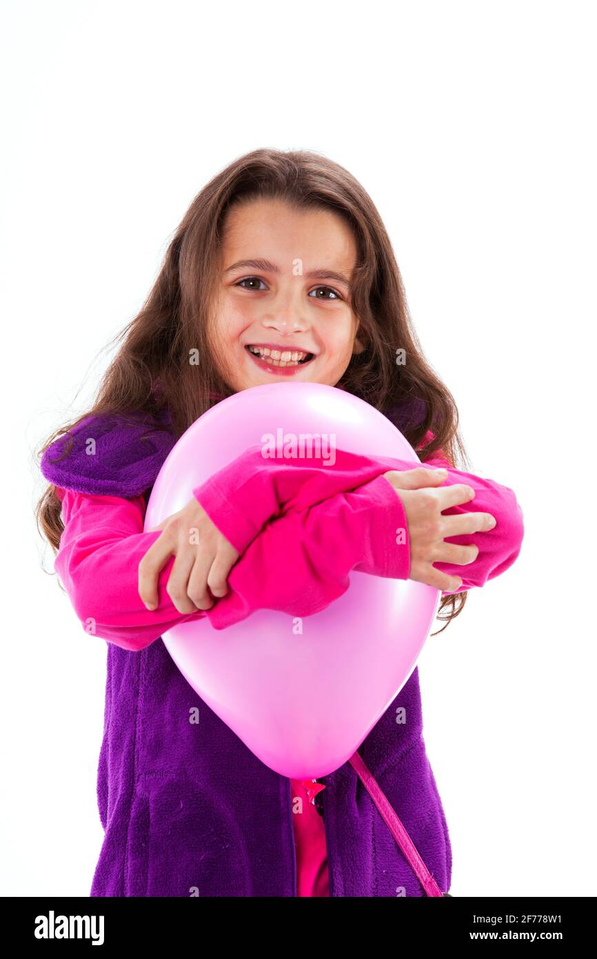 Little girl holding a balloon Stock Photo - Alamy