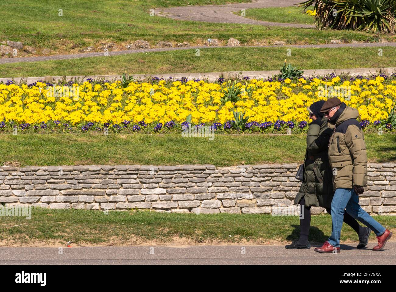 Senior couple walking in Southend on Sea, Essex, UK, on a bright, sunny ...