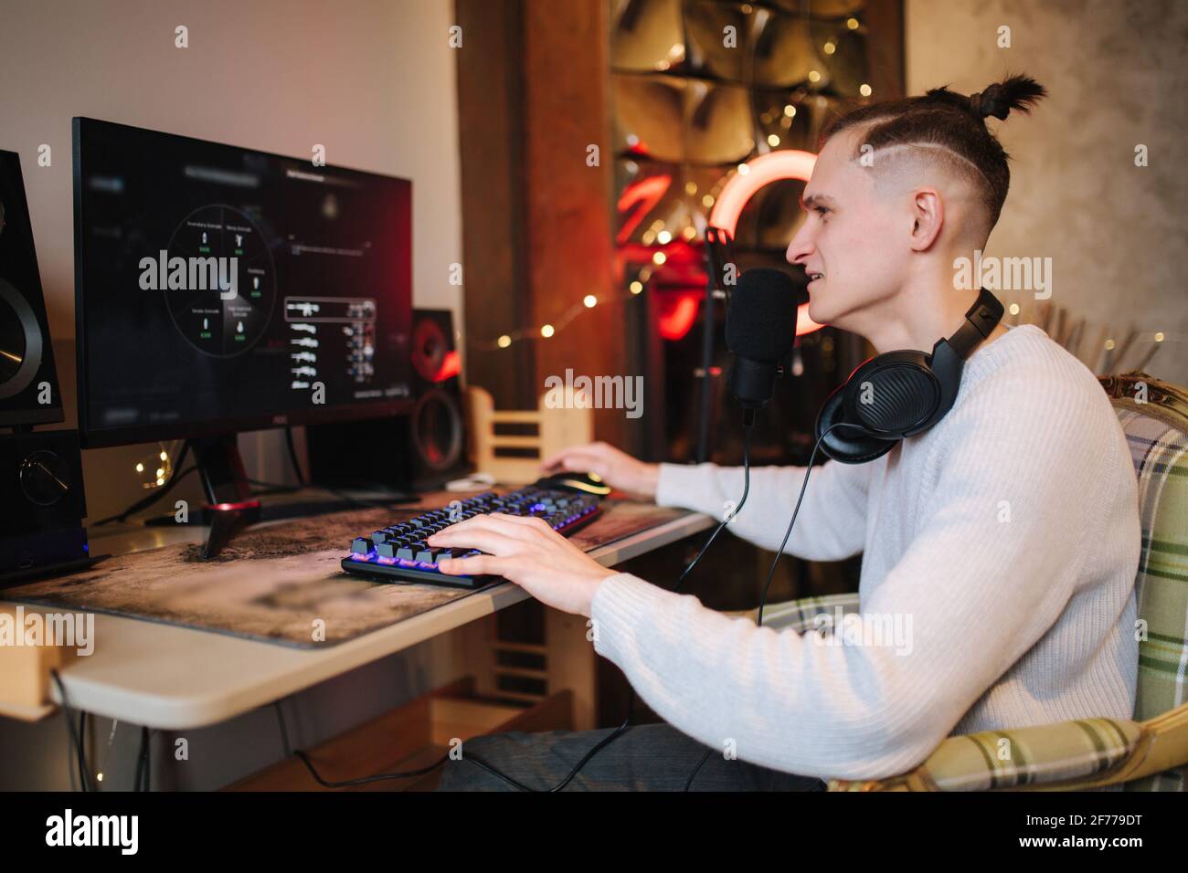 Streamer cyber performing space video game on powerful pc talking with ...