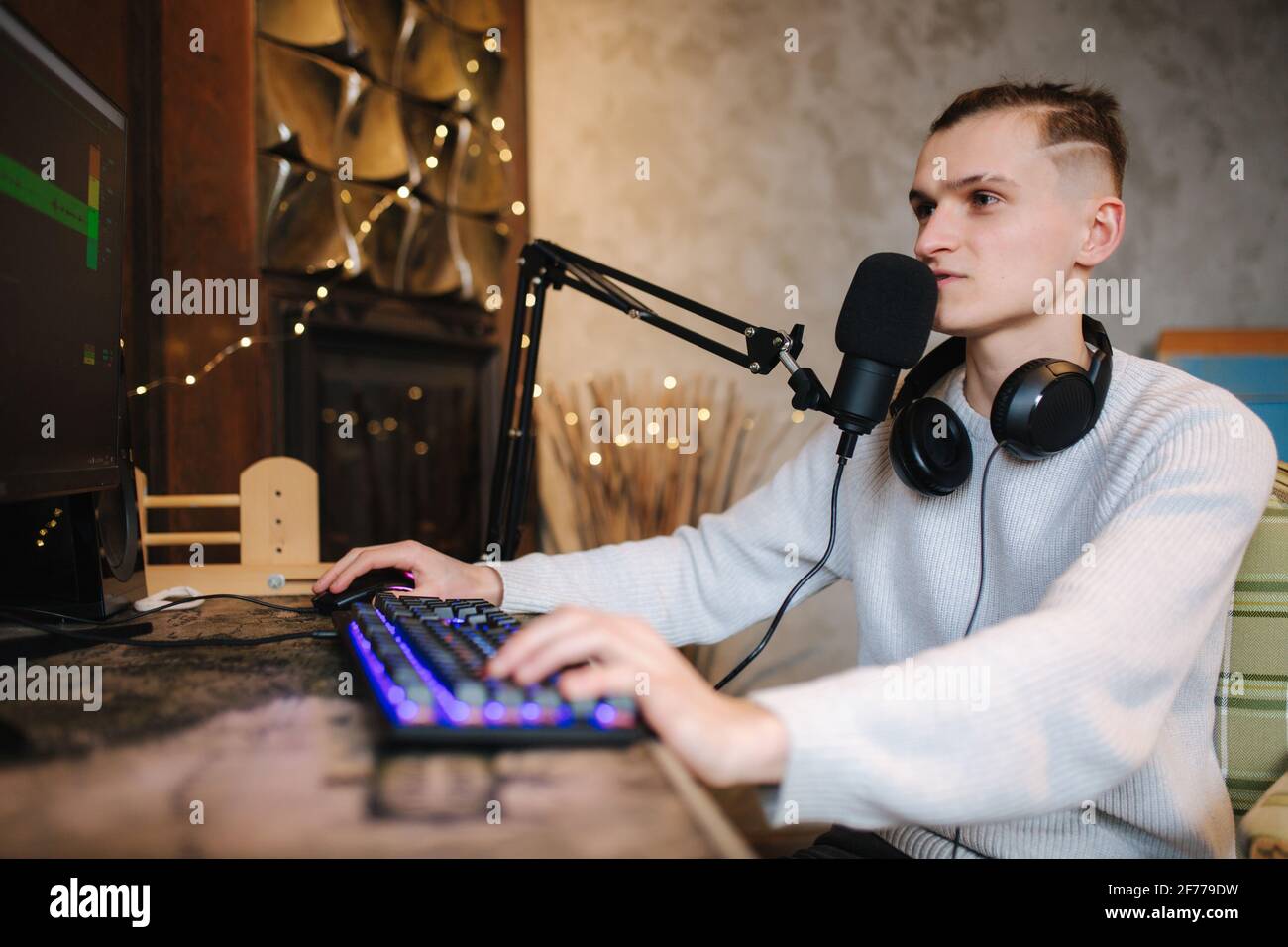 Streamer cyber performing space video game on powerful pc talking with ...