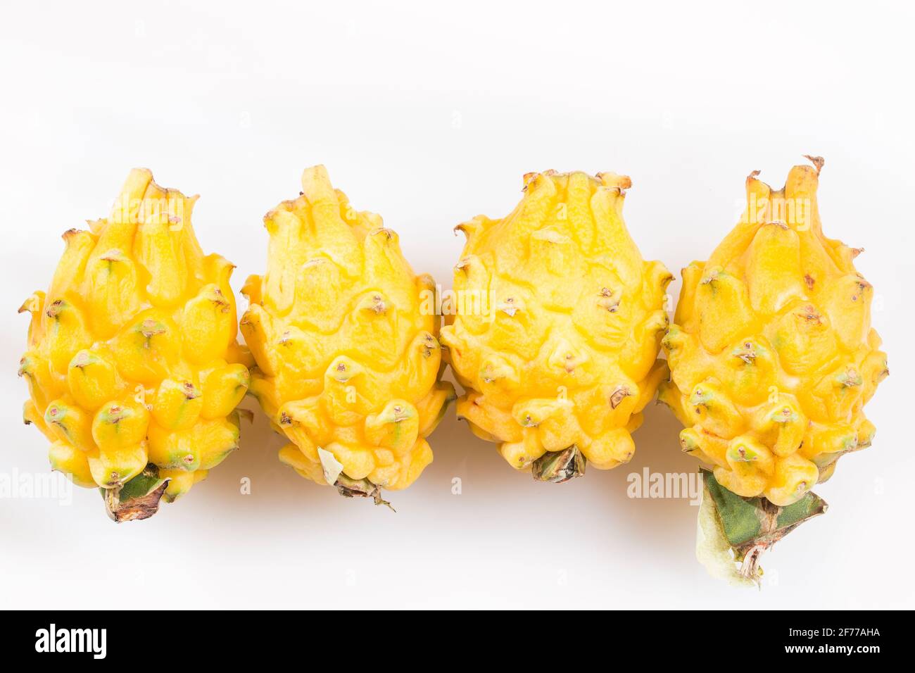 Fresh yellow pitaya on white background - Selenicereus megalanthus ...