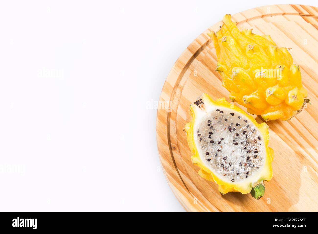 Fresh yellow pitaya on white background - Selenicereus megalanthus ...
