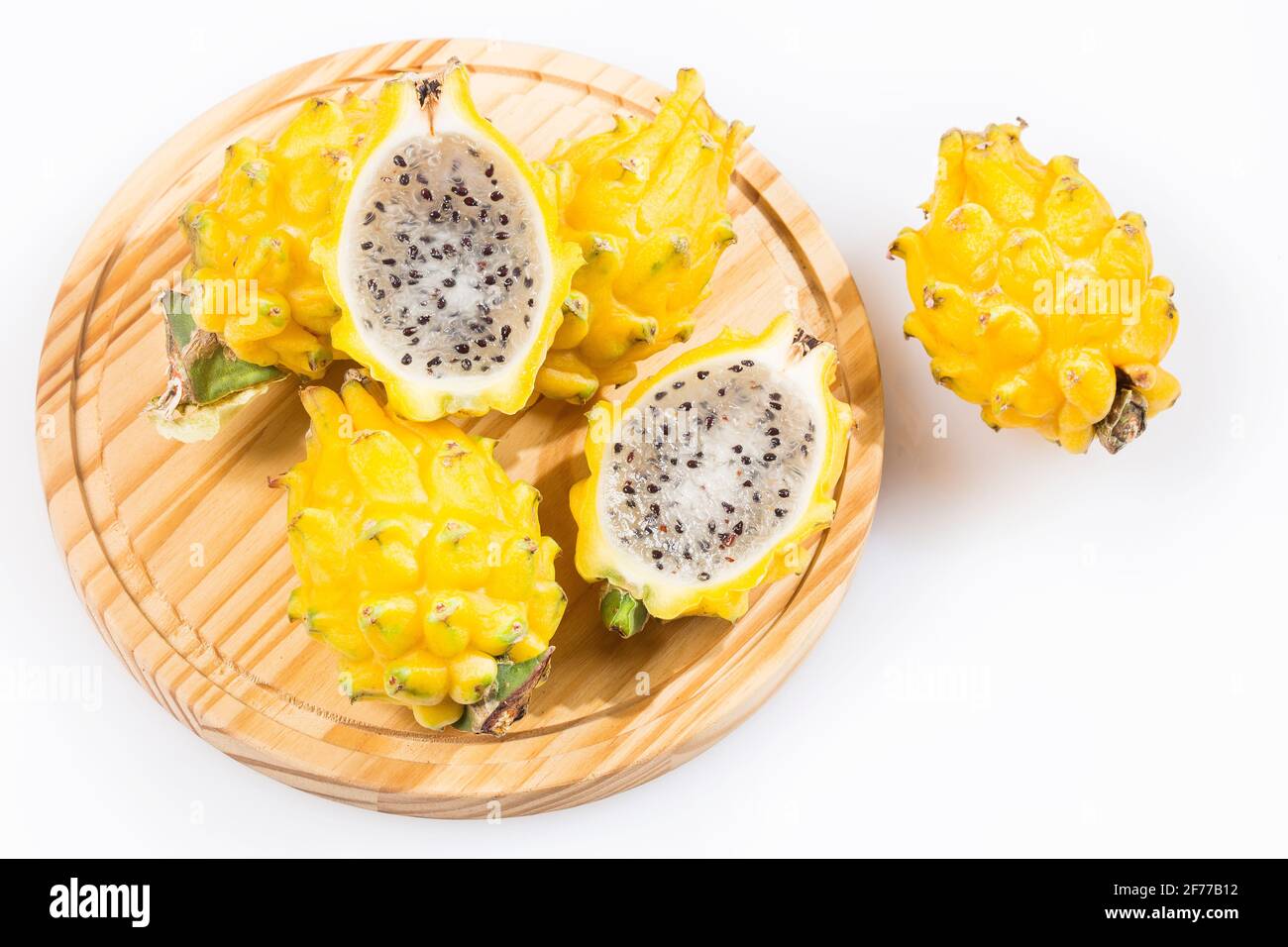 Fresh yellow pitaya on white background - Selenicereus megalanthus ...
