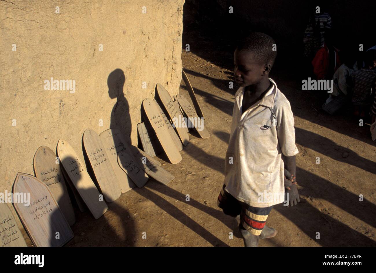 Quranic students in a wooden tablets, Djenné, Mali Stock Photo - Alamy