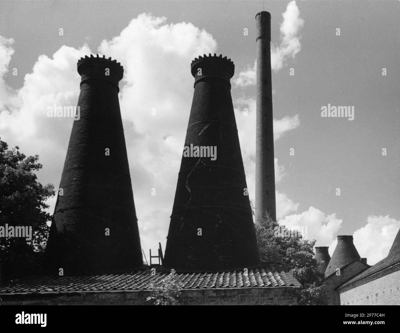 Two industrial chimneys from hi-res stock photography and images - Alamy