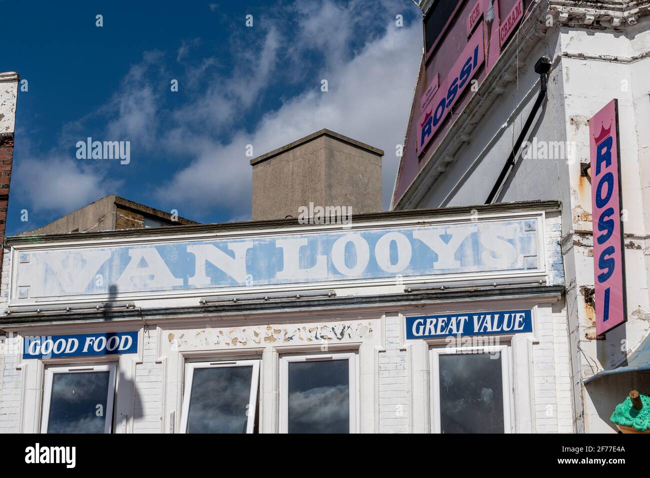Old shop sign uncovered in Southend on Sea, Essex, UK. Van Looys ...