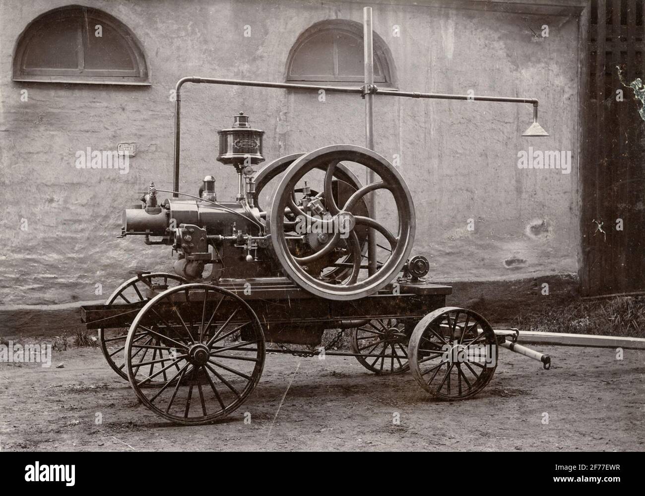 A 10 hp ambulatory, water-cooled, 4-stroke kerosene engine with glow ...