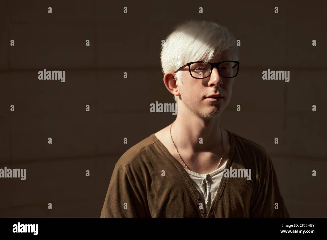 Portrait of european albino boy wearing glasses Stock Photo - Alamy