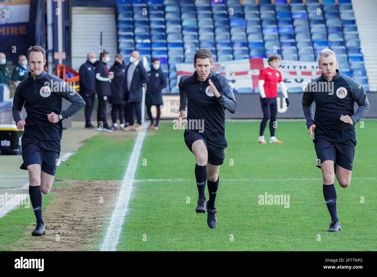 Luton, UK. 05th Apr, 2021. Referee Matt Donohue warms up with Assistant ...