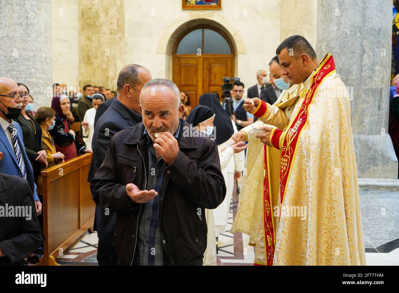 Receive holy communion hi-res stock photography and images - Alamy