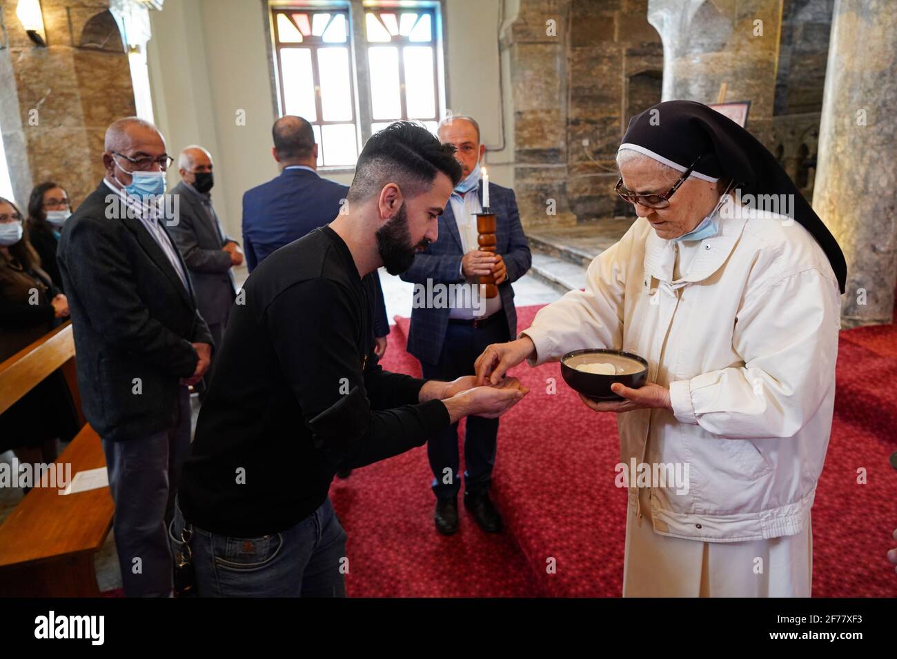 Receive holy communion hi-res stock photography and images - Alamy