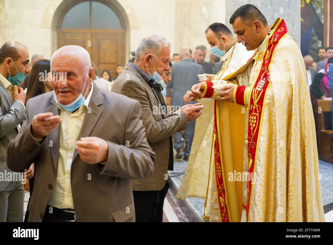Receive holy communion hi-res stock photography and images - Alamy