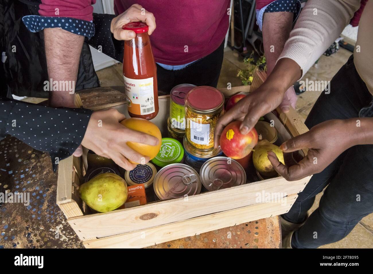 Fruit crate and cans Stock Photo - Alamy