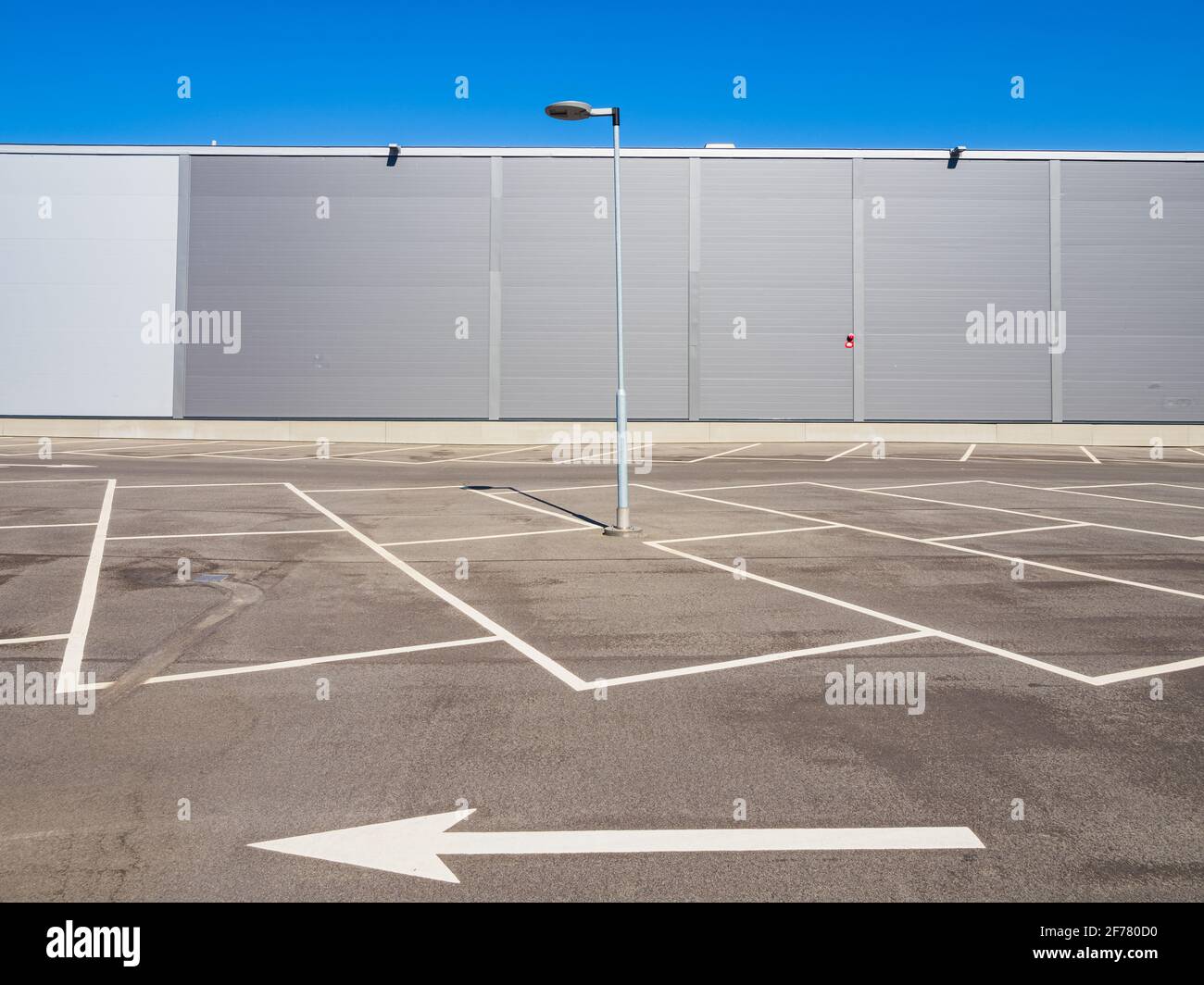 Empty parking in front of an aluminium cladding modern building Stock ...