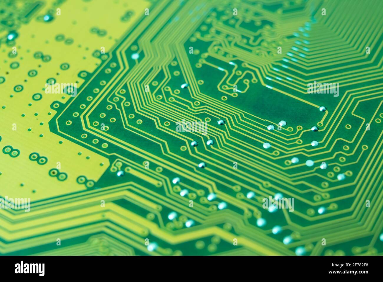 Tracks on the green PCB close up, background or texture Stock Photo - Alamy