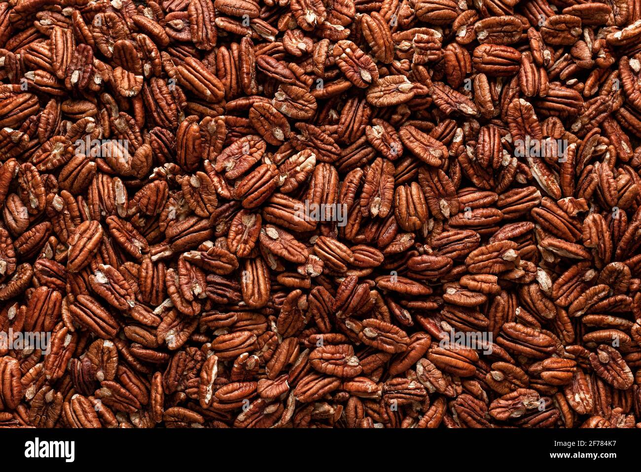 Pile of pecans, full-frame image, directly above view. Pecan nuts ...