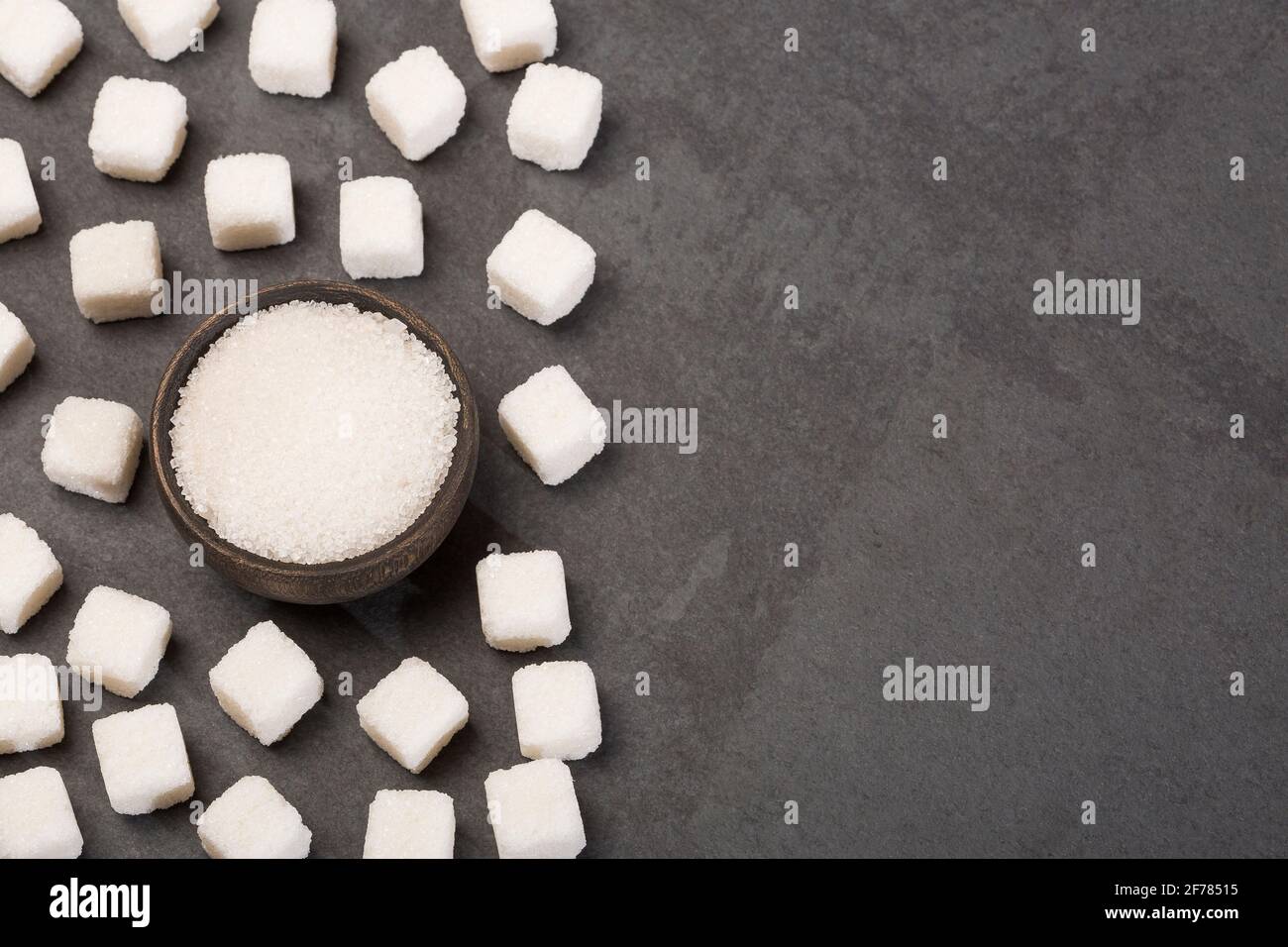 Powdered sugar and sugar cubes - Text space Stock Photo - Alamy