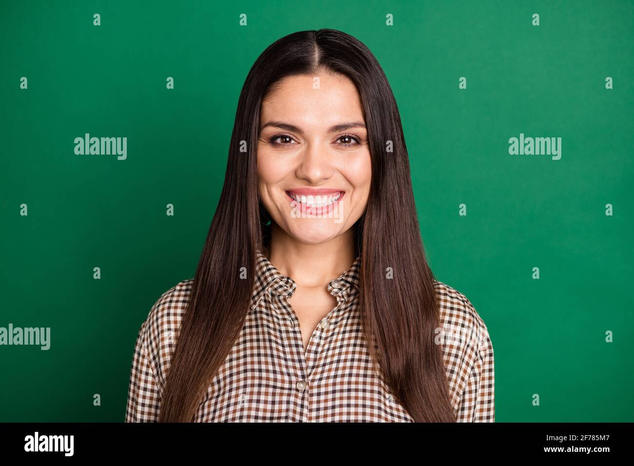 Photo of cheerful lovely woman look camera toothy smile wear plaid ...