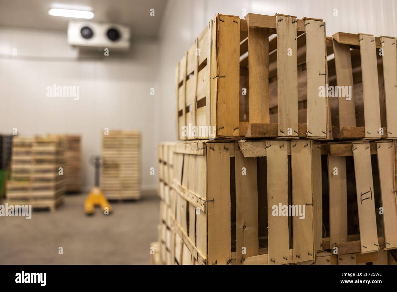 Arranged crates ready to be used. Storage interior Stock Photo - Alamy