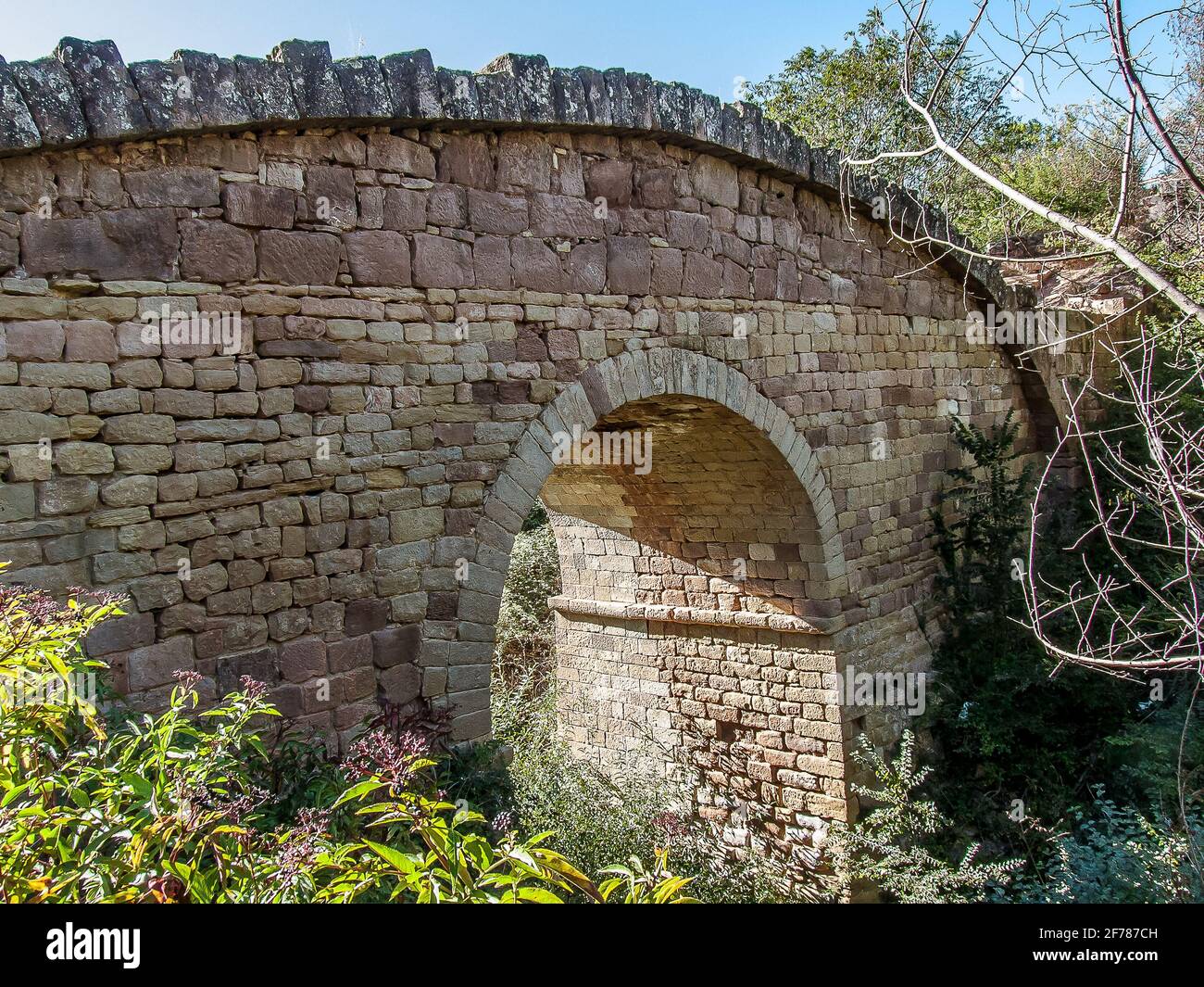 Medieval Roman bridge on the camino, Cirauqui, Navarre, Spain, October ...