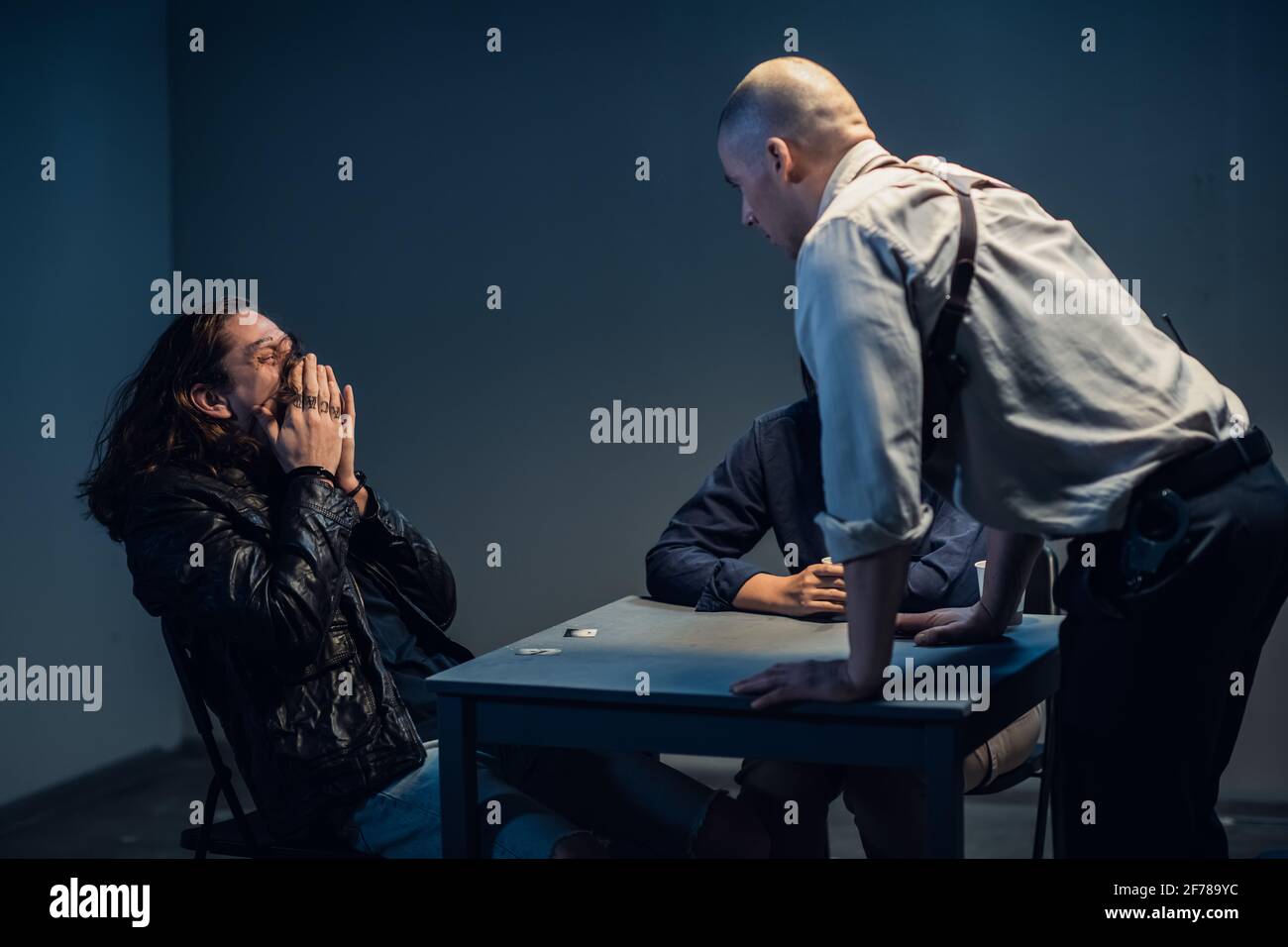 Interrogating witness at crime scene hi-res stock photography and ...