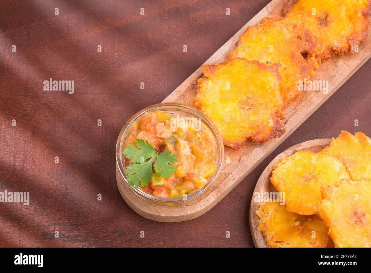 Patacón fried flattened pieces of green plantain (tostón, tachino Stock ...